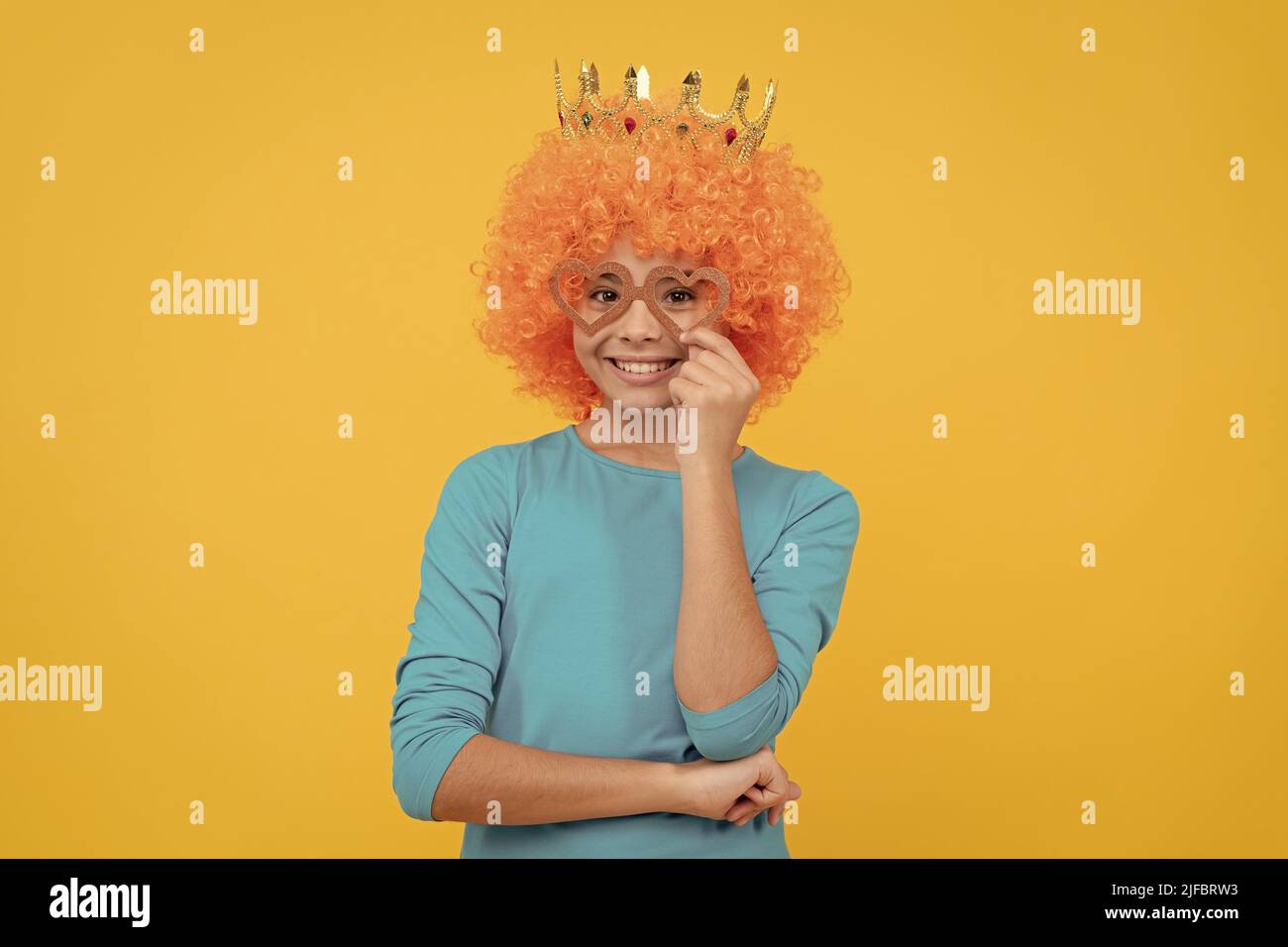happy teen girl in fancy clown wig wear queen crown and funny party ...