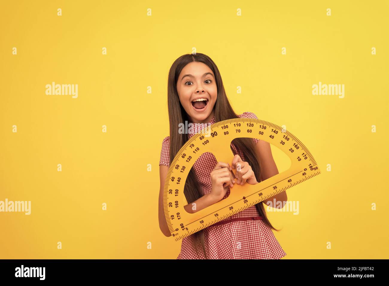 surprised kid study math in school hold protractor ruler, mathematics ...