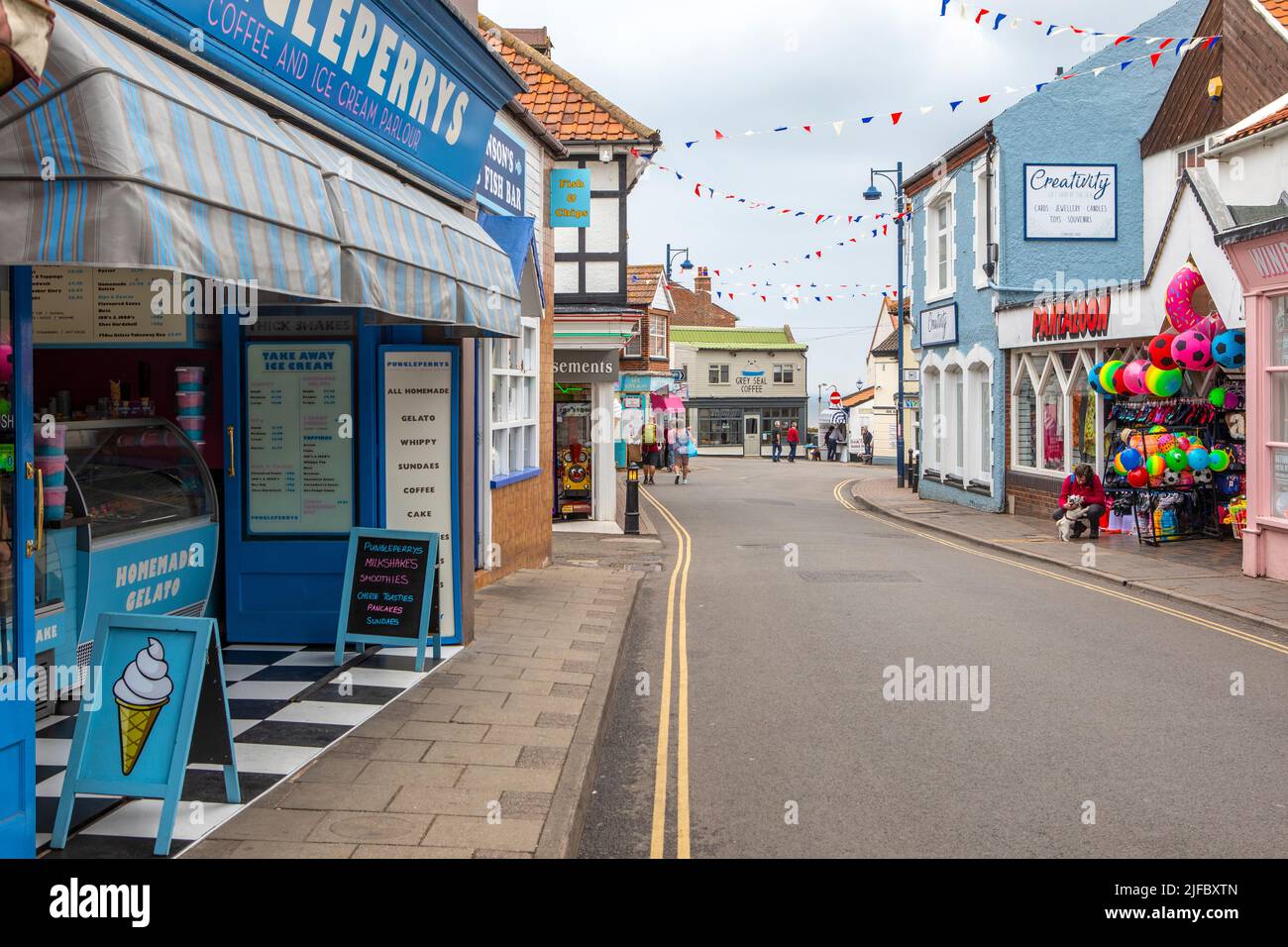 Sheringham, UK - May 16th 2022: View down the the High Street in the ...