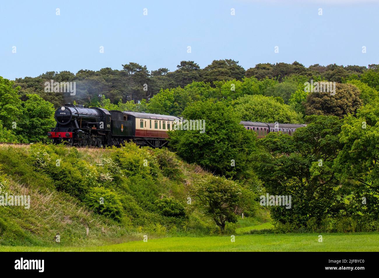 Sheringham, UK - May 16th 2022: A steam train running on the North ...