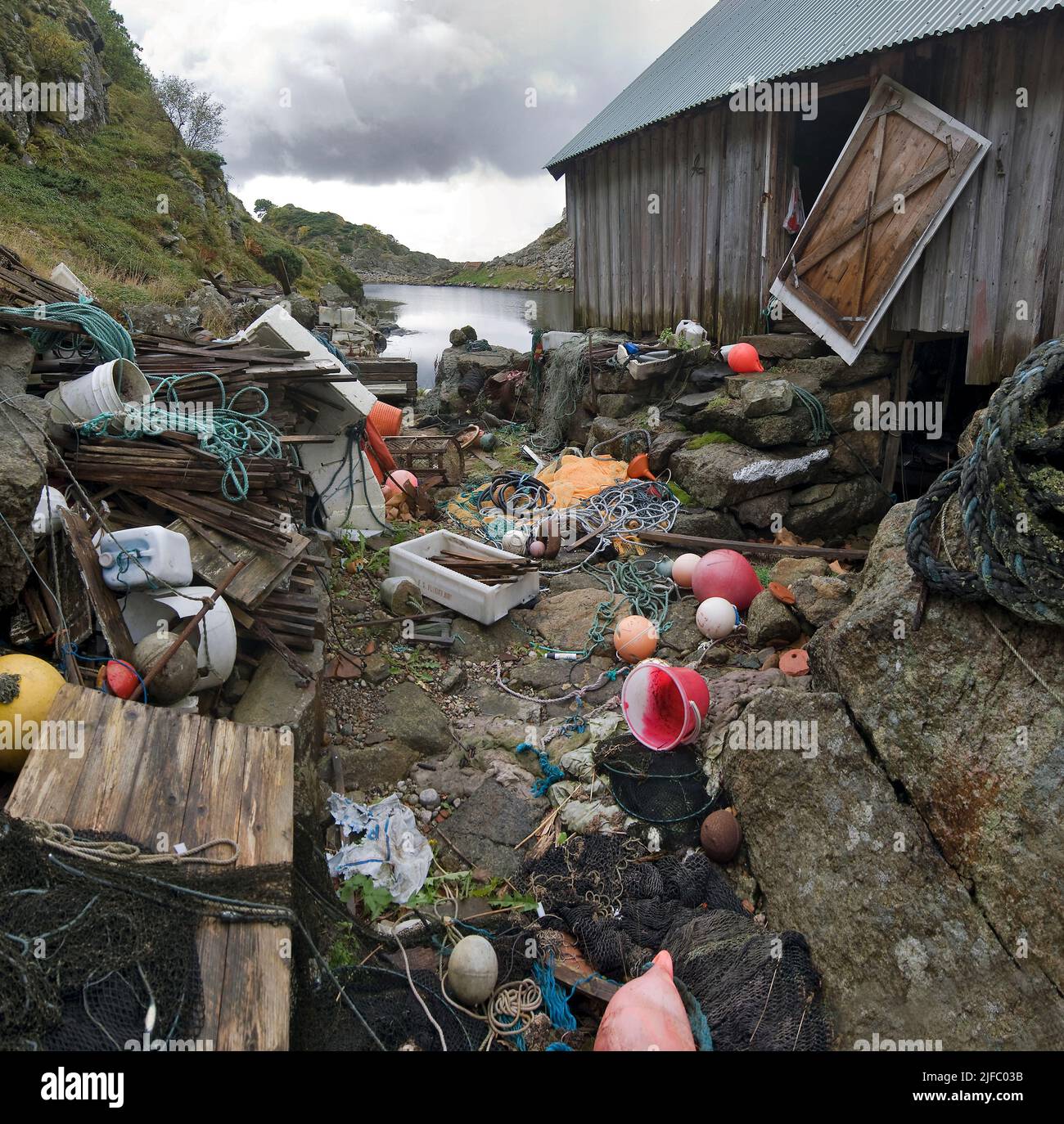 Messy fishing-tackle after the storm outside an old Norwehian boat ...