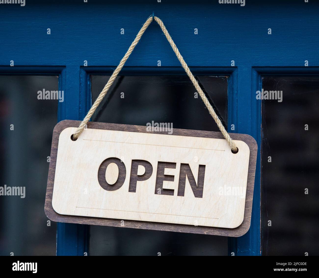 Close-up of an OPEN sign on a shop doorway Stock Photo - Alamy