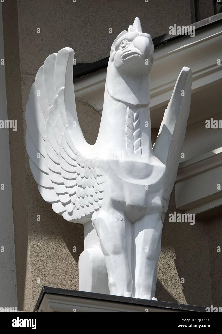 Kiev, Ukraine June 10, 2021: Sculpture of a Griffin eagle head in the ...