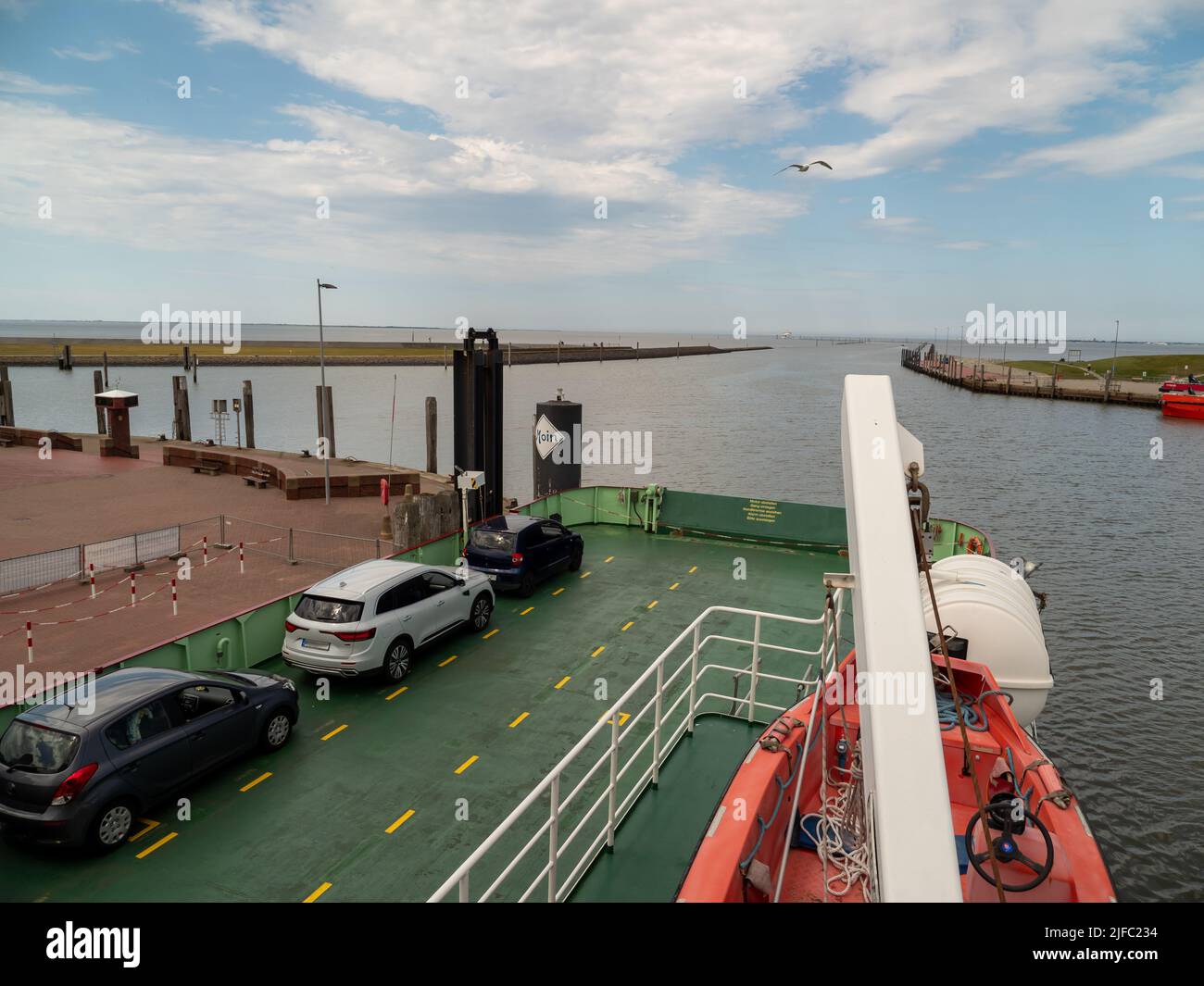 The barge transports cars and people. Barge for transportation Stock ...