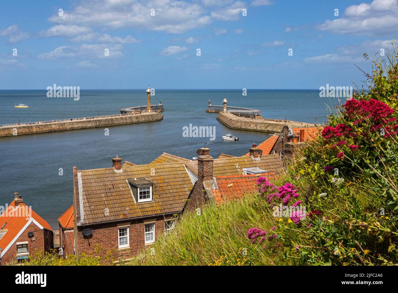 View of the lighthouses of Whitby Harbour, from the 199 steps in the ...