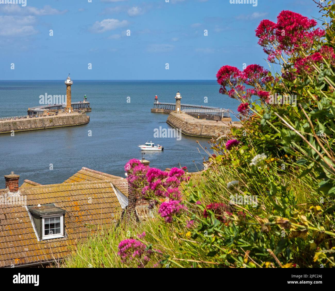 View of the lighthouses of Whitby Harbour, from the 199 steps in the ...