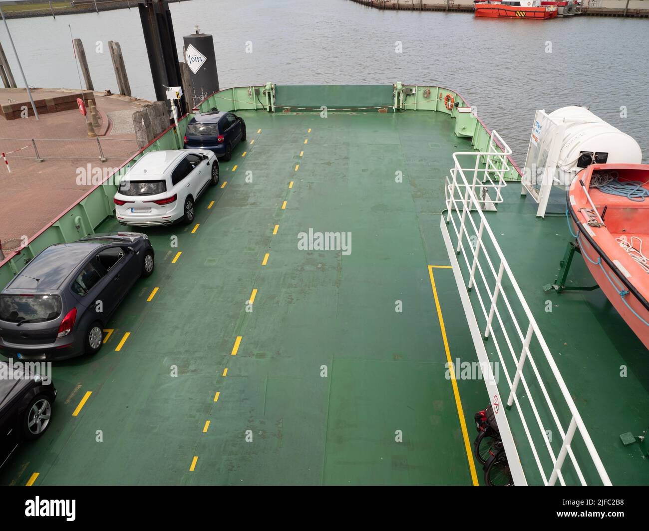 The barge transports cars and people. Barge for transportation Stock ...