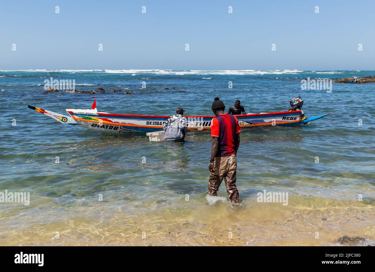 Dakar, Senegal. August 18, 2019: Fishermen with a fishing boat in a ...