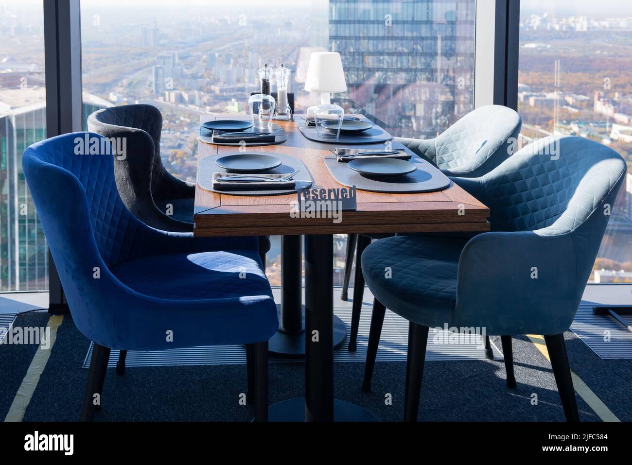 MOSCOW, RUSSIA - OCTOBER 10, 2021: Reserved table in the restaurant of ...