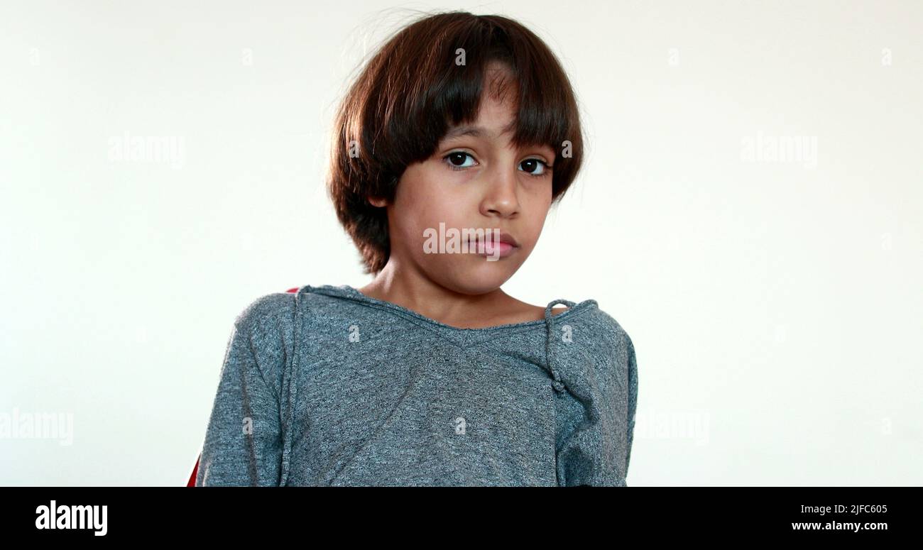 Fearful child shaking head portrait emotional face, kid negation Stock ...