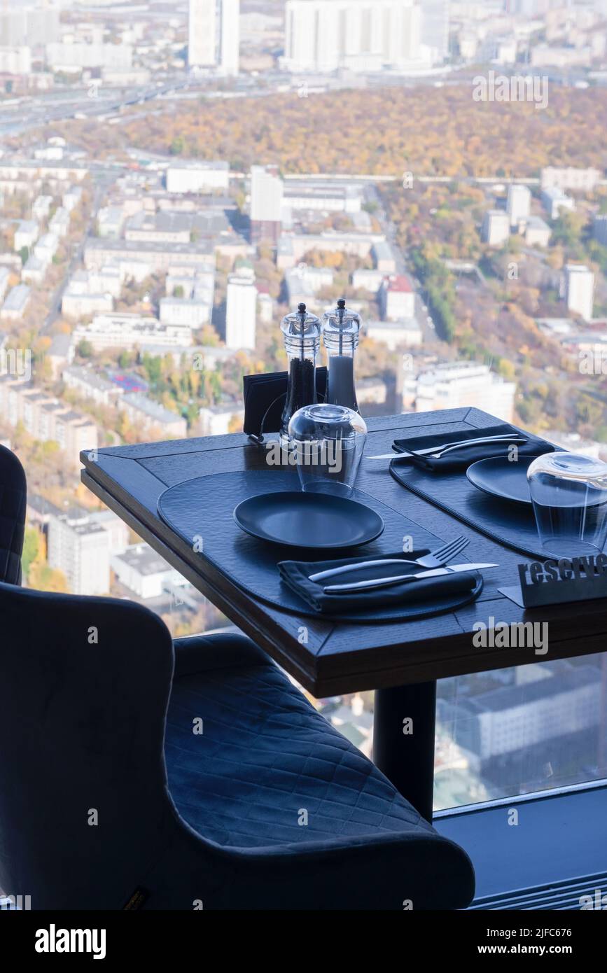 MOSCOW, RUSSIA - OCTOBER 10, 2021: Reserved table in the restaurant of ...
