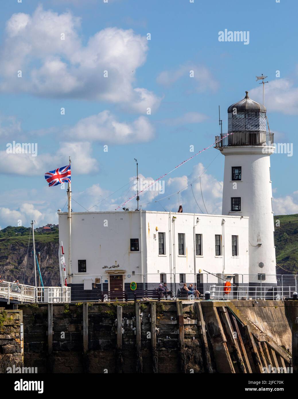 Scarborough, UK - June 8th 2022: A view of Scarborough Pier Lighthouse ...