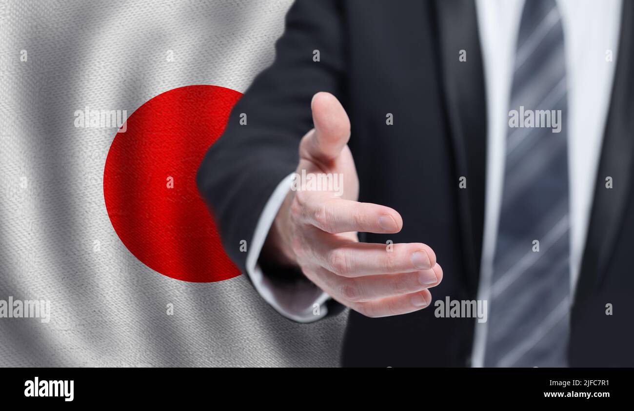 Japanese business, politics, cooperation and travel concept. Hand on ...
