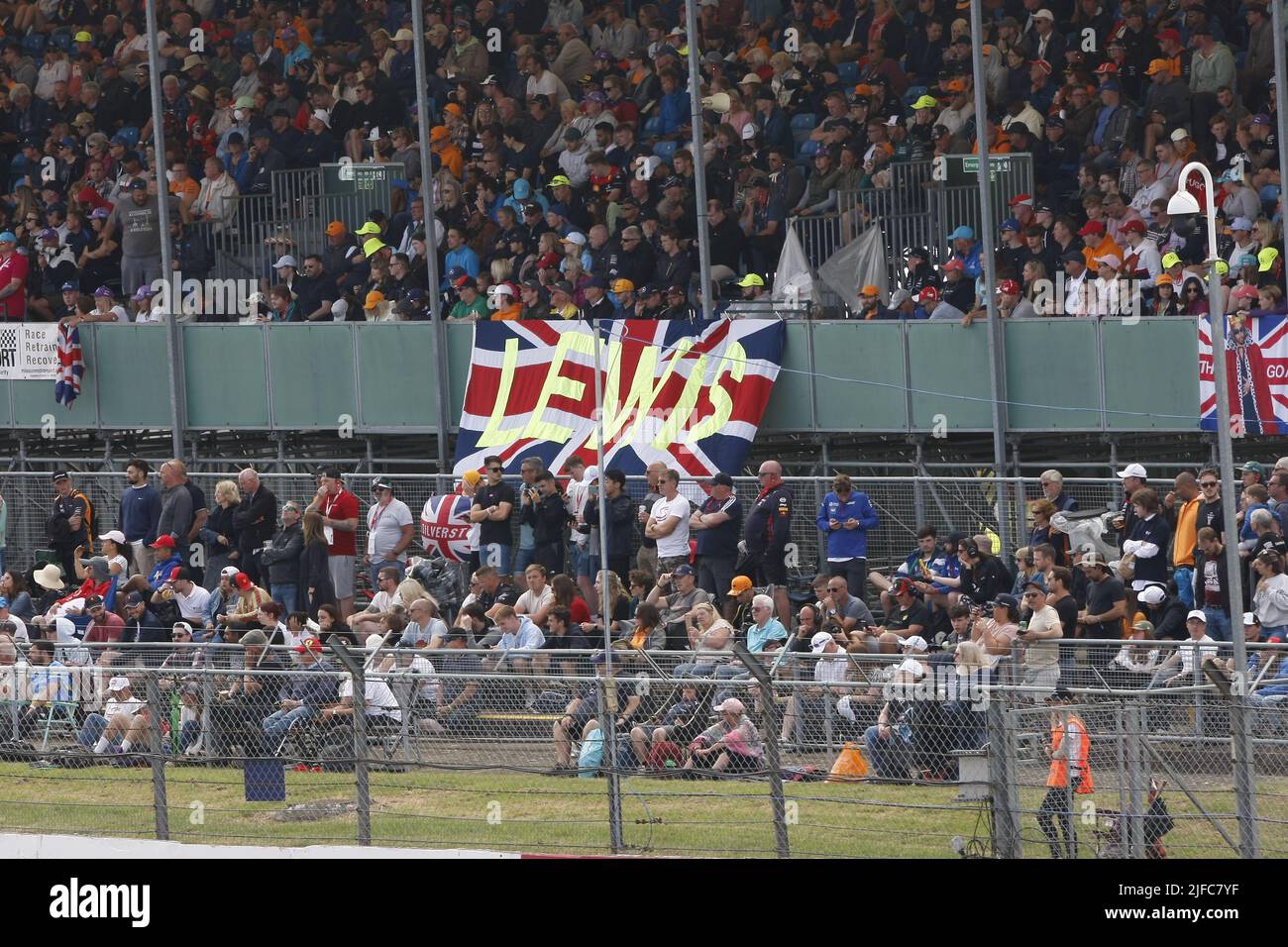 Silverstone, Northants, UK. 1st July, 2022. Lewis Hamilton flags fly ...