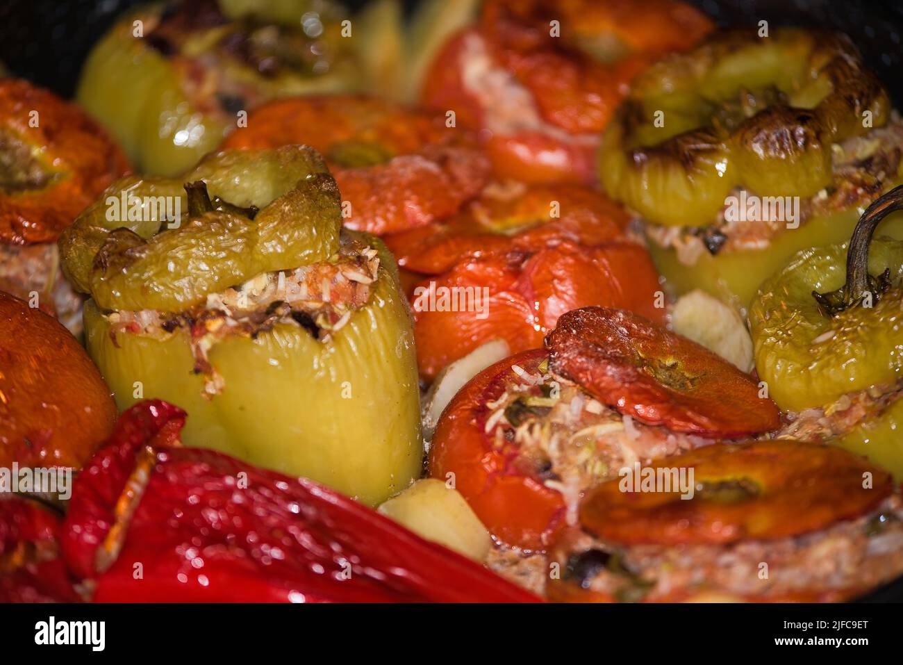 Greek summer food, gemista. stuffed tomatoes and peppers with rice ...