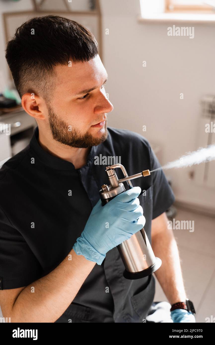 ENT doctor spray nitrogen for cryo therapy. Procedures of for mucosal ...