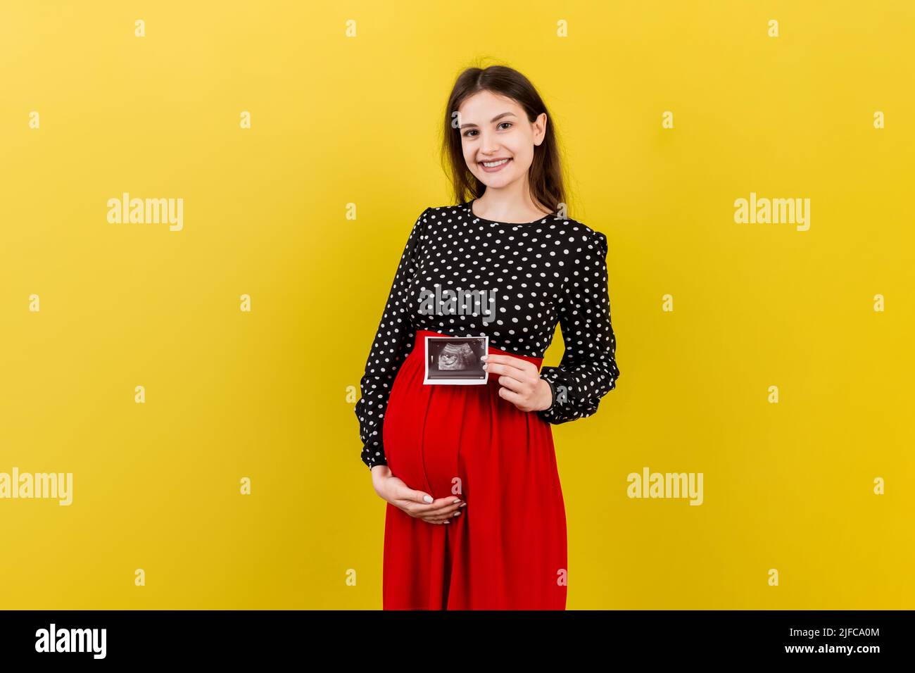 Cute Pregnant Lady Posing With Baby Sonography Photo Near Colored ...