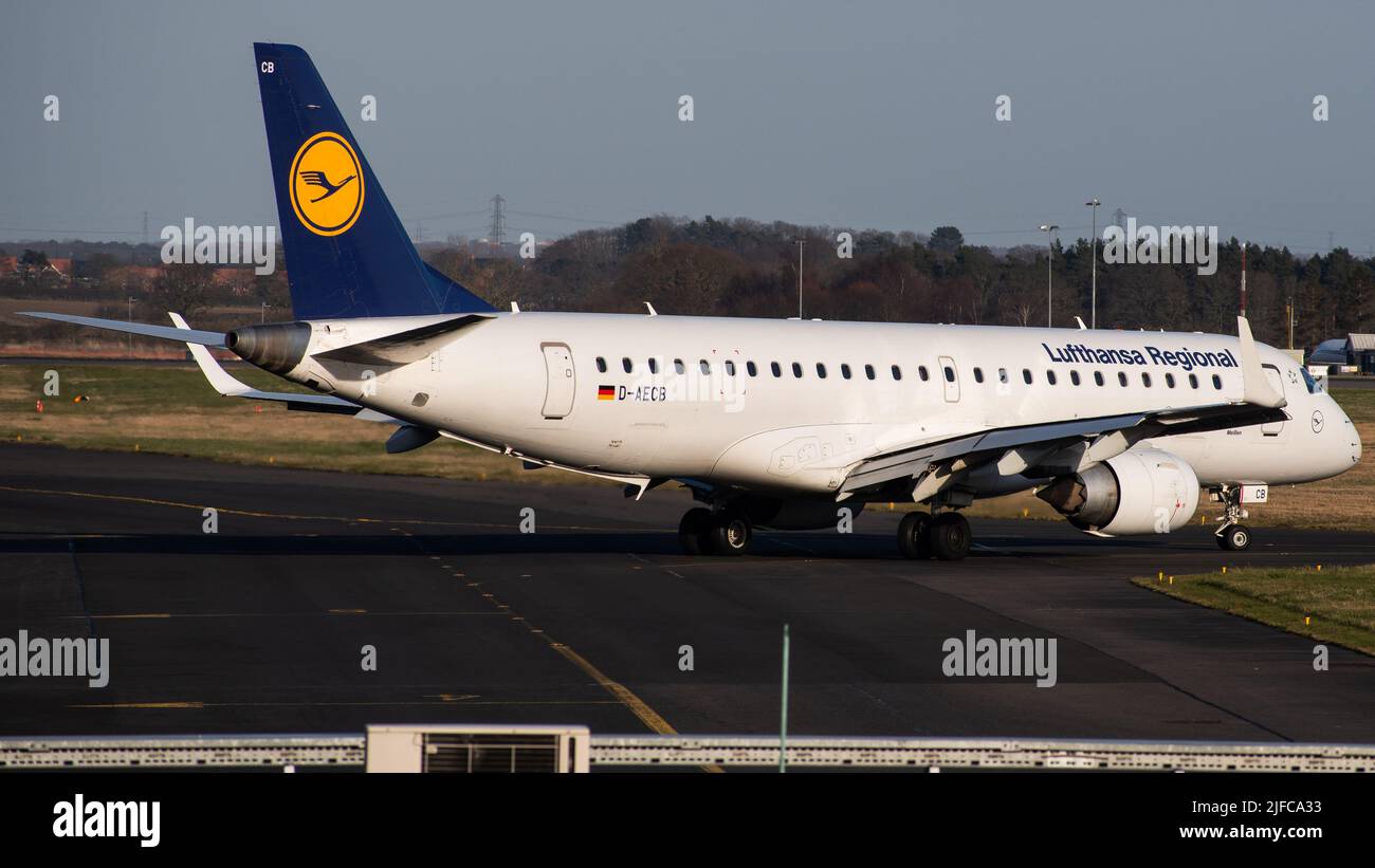 The Lufthansa Embraer E190LR D-AECB taxiing to runway 07 at Newcastle ...