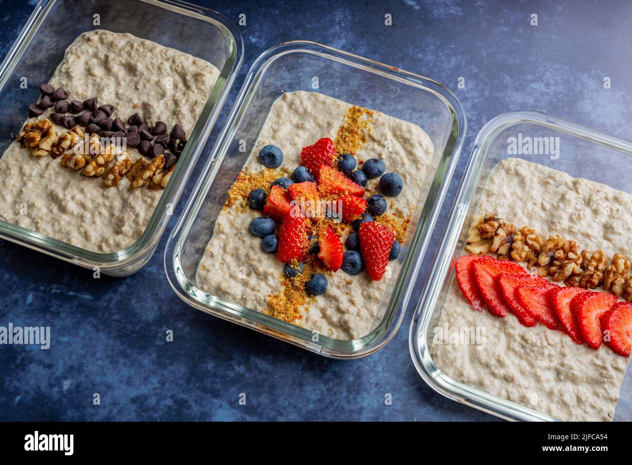 Three oatmeal breakfast combinations with different toppings Stock ...