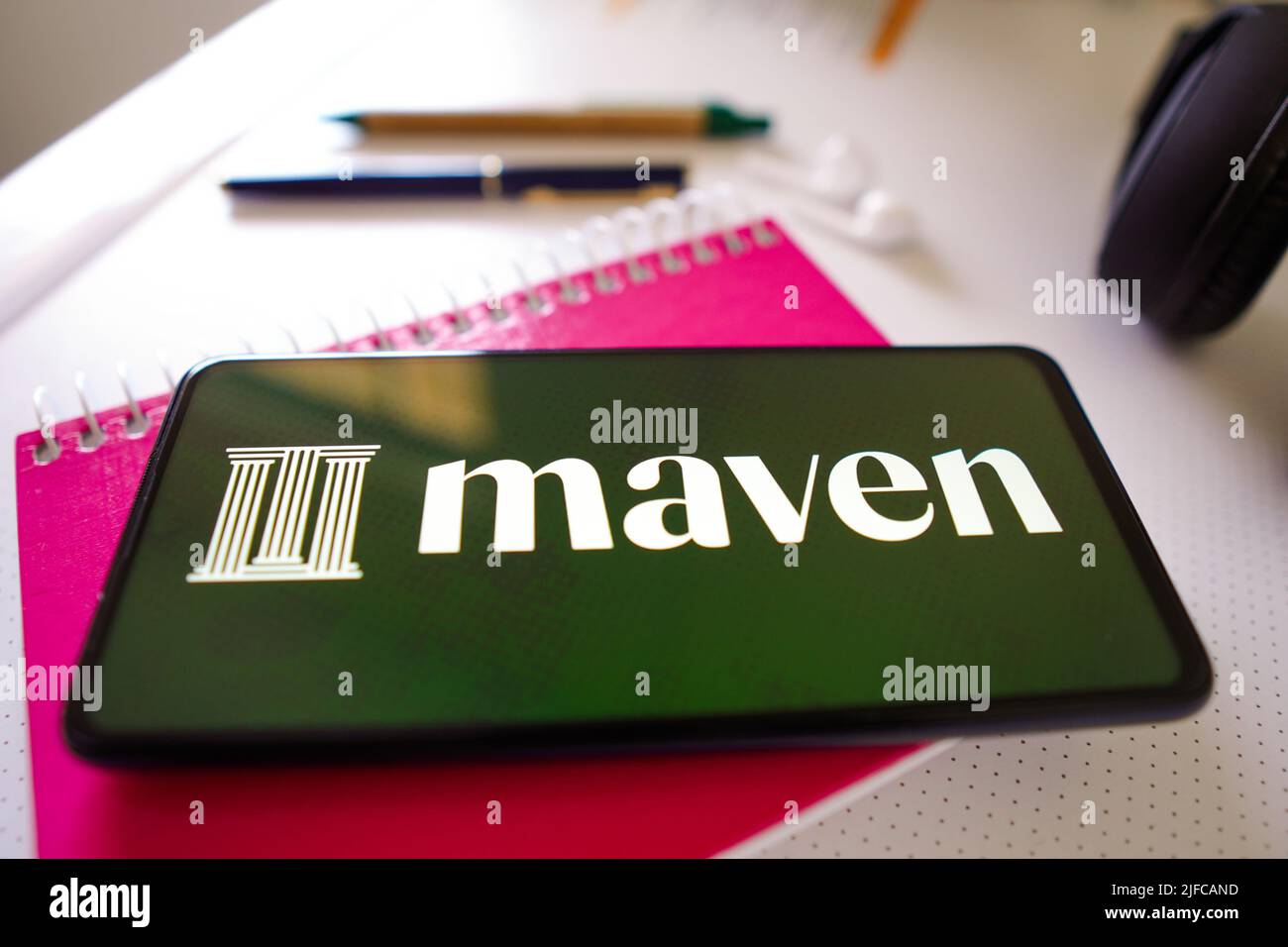 In this photo illustration the Maven logo seen displayed on a ...