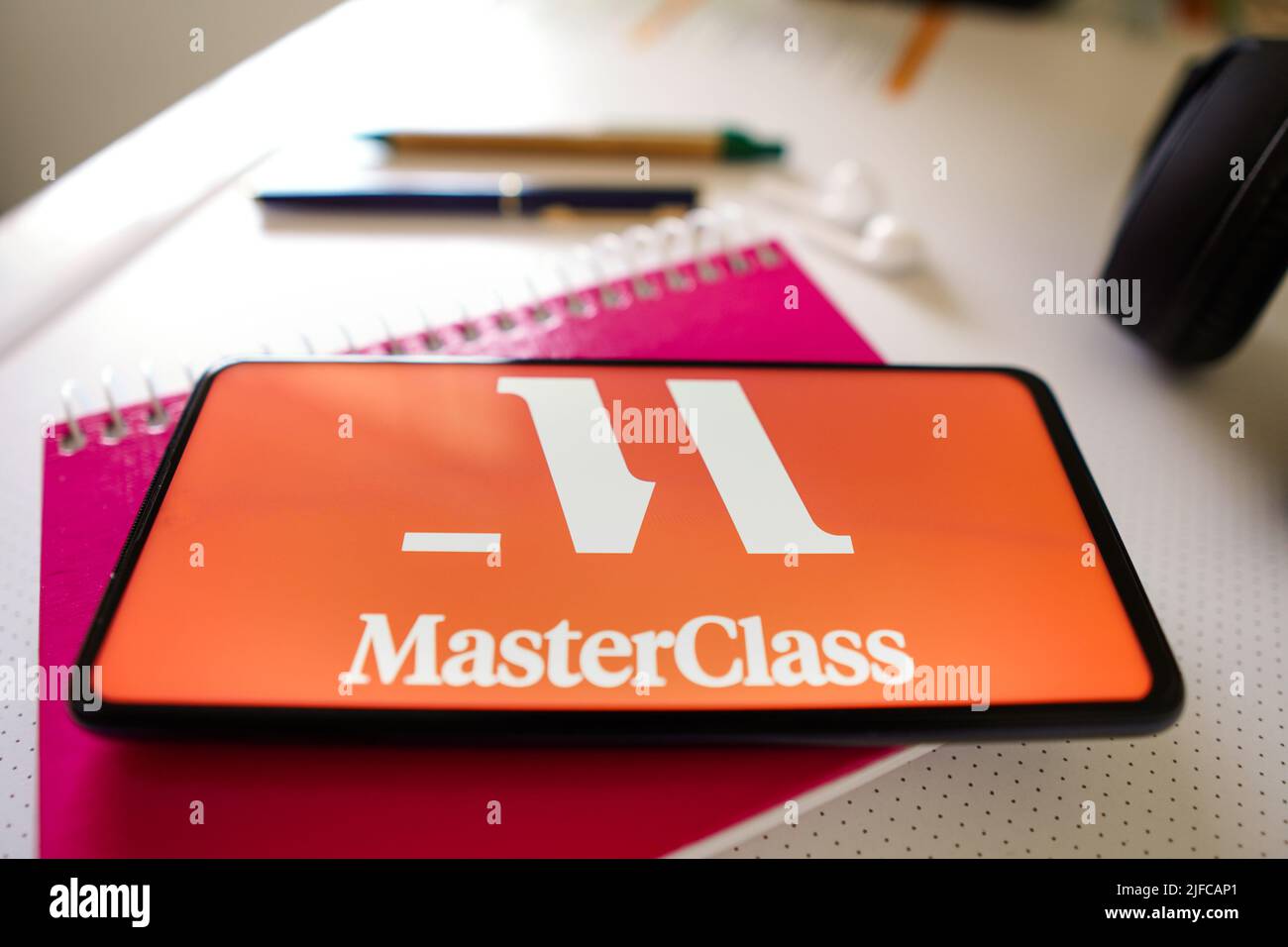 In this photo illustration the MasterClass Online Classes logo seen ...