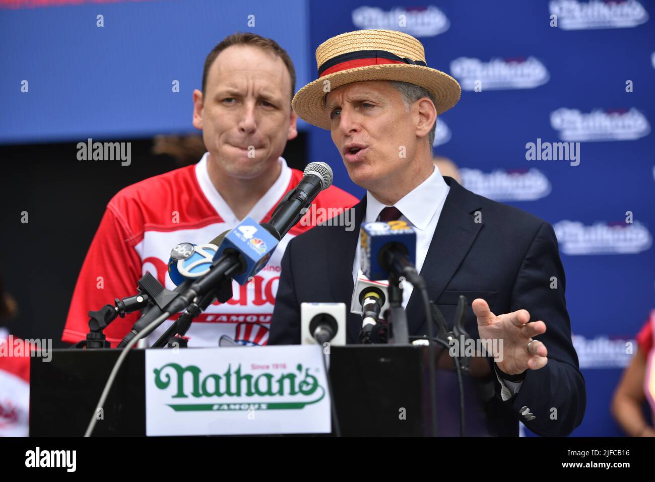 Mens champion Joey Chestnut and George Shea attend the official weight ...