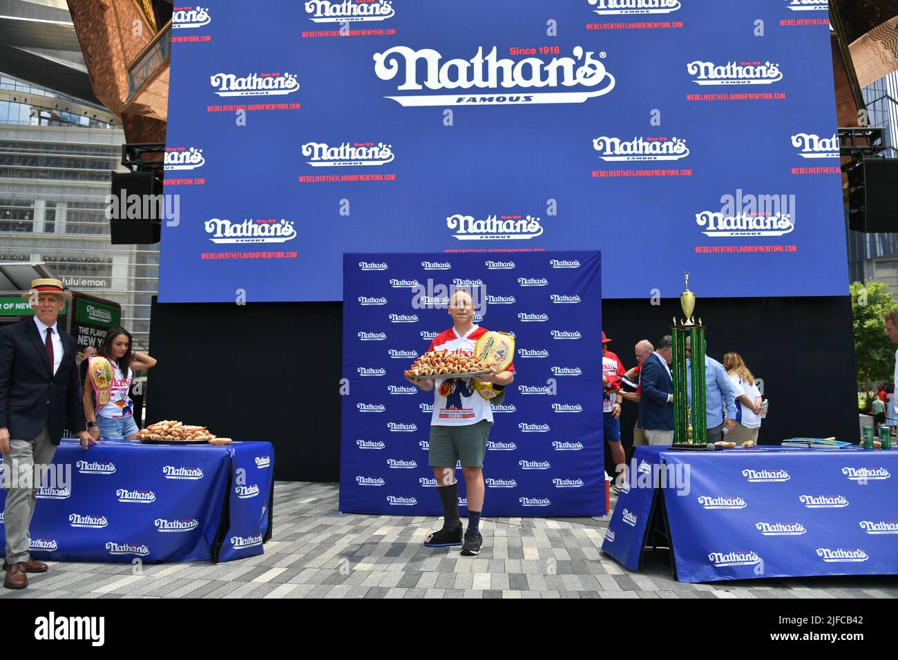 Mens champion Joey Chestnut and George Shea attend the official weight ...