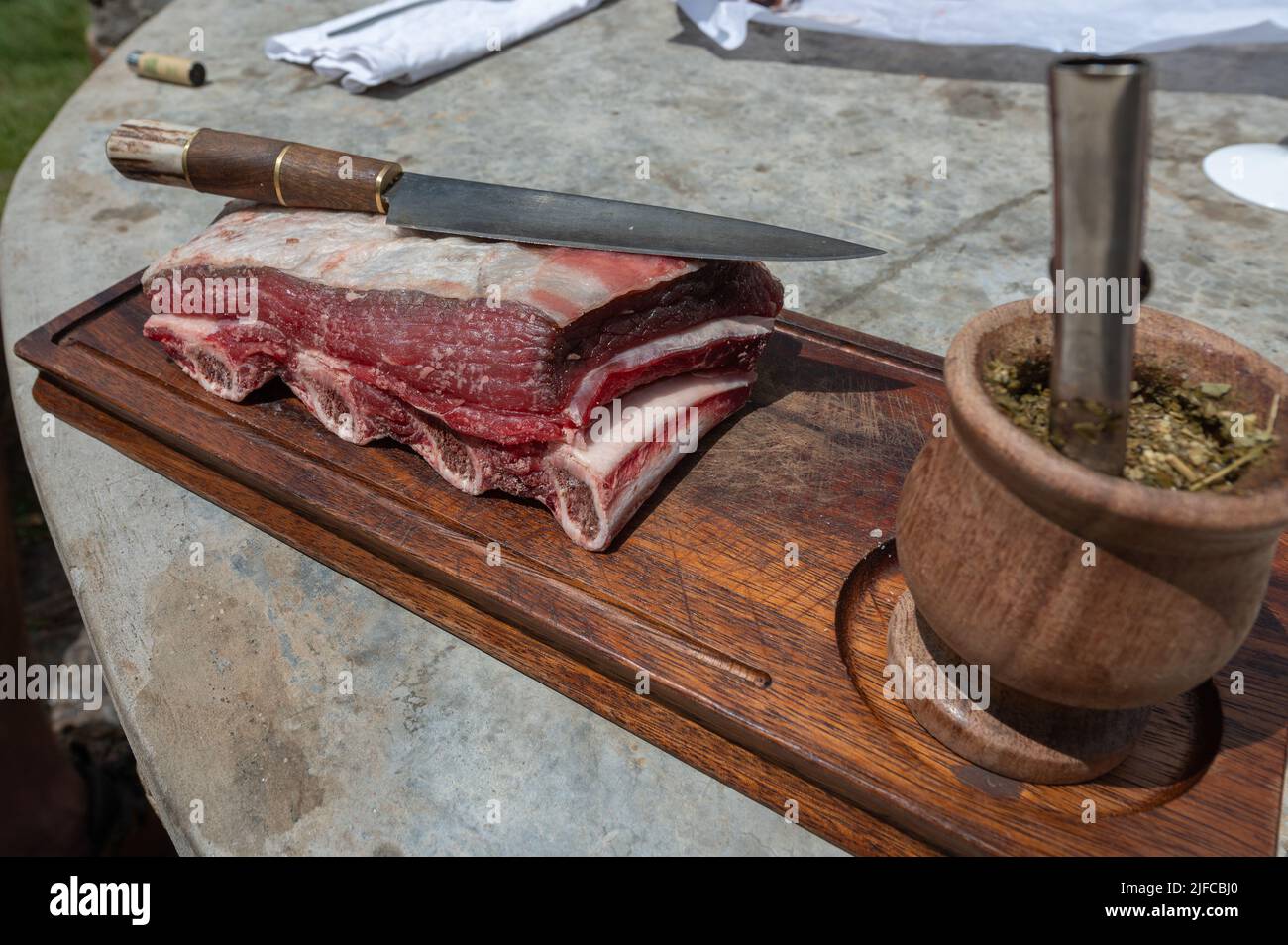 Typical Uruguayan and Argentine Asado Cooked on fire. Entrana and Vacio ...