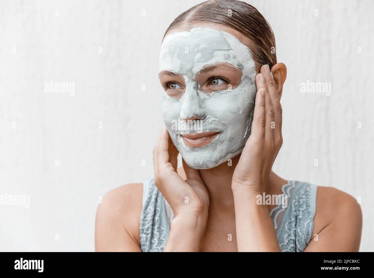 Beautiful woman with facial mask hi-res stock photography and images ...