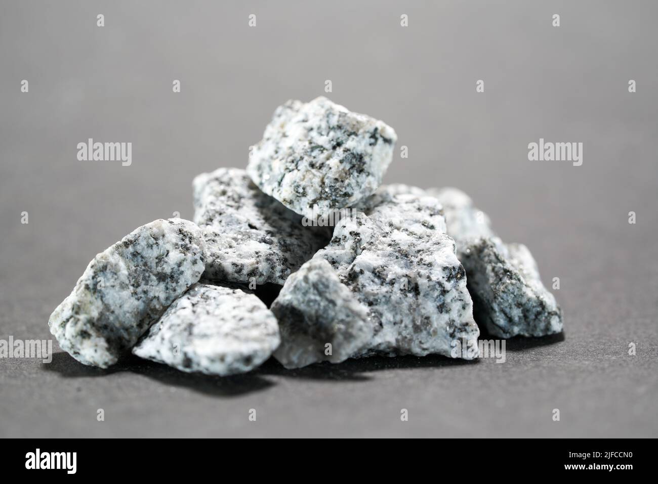Granites are coarsely crystalline plutonic rocks (plutonites) rich in ...