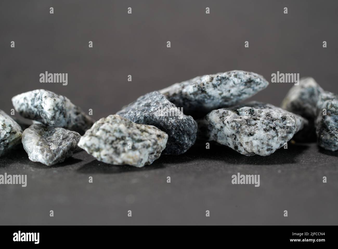 Granites are coarsely crystalline plutonic rocks (plutonites) rich in ...