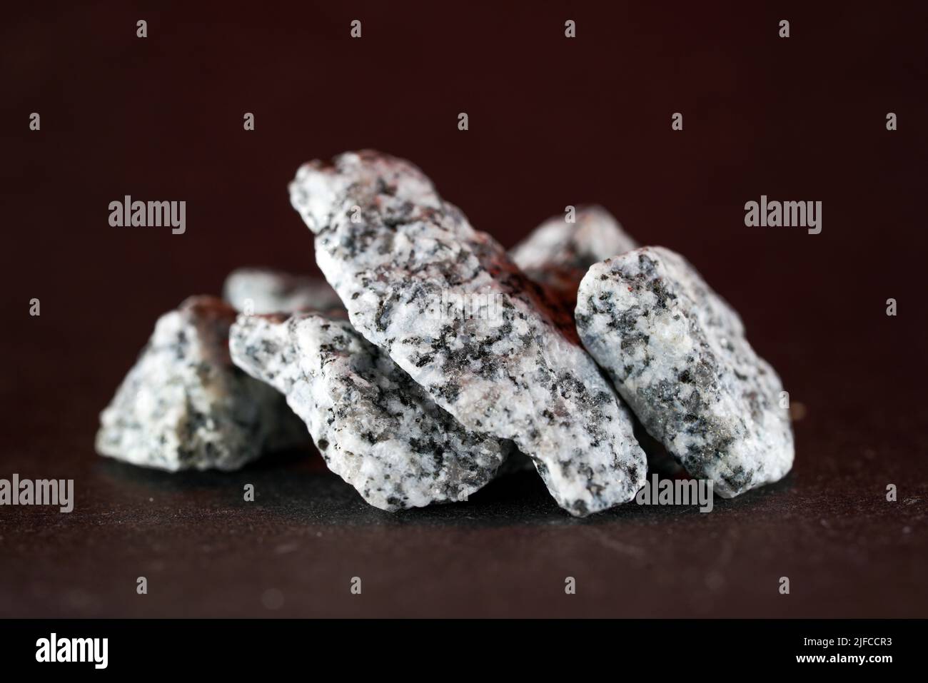 Granites are coarsely crystalline plutonic rocks (plutonites) rich in ...