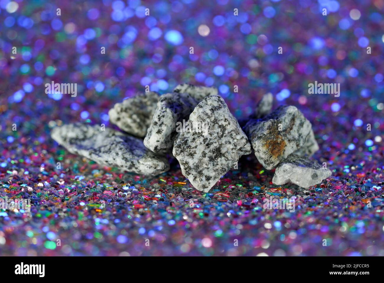 Granites are coarsely crystalline plutonic rocks (plutonites) rich in ...