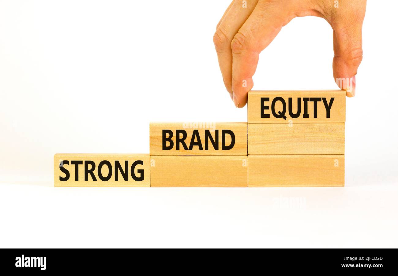 Strong brand equity symbol. Concept words Strong brand equity on wooden ...