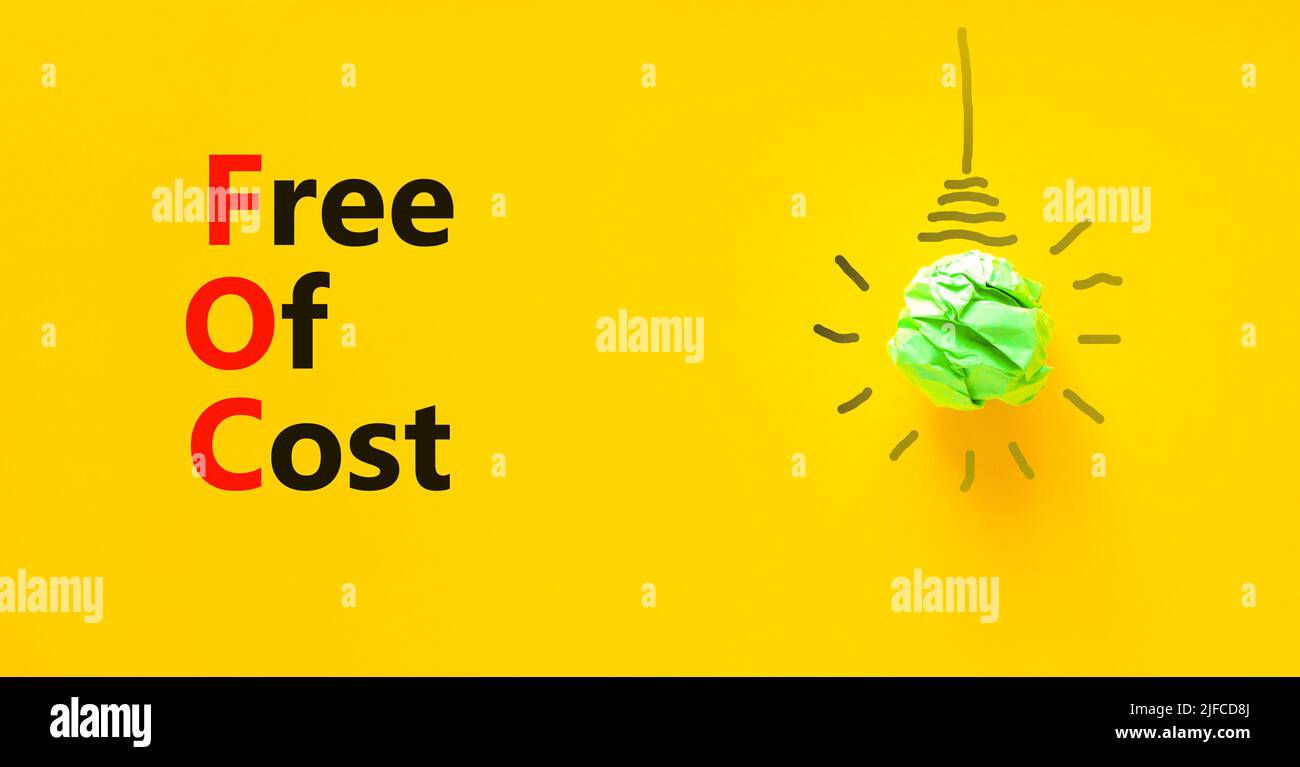 FOC free of cost symbol. Concept words FOC free of cost on yellow paper ...