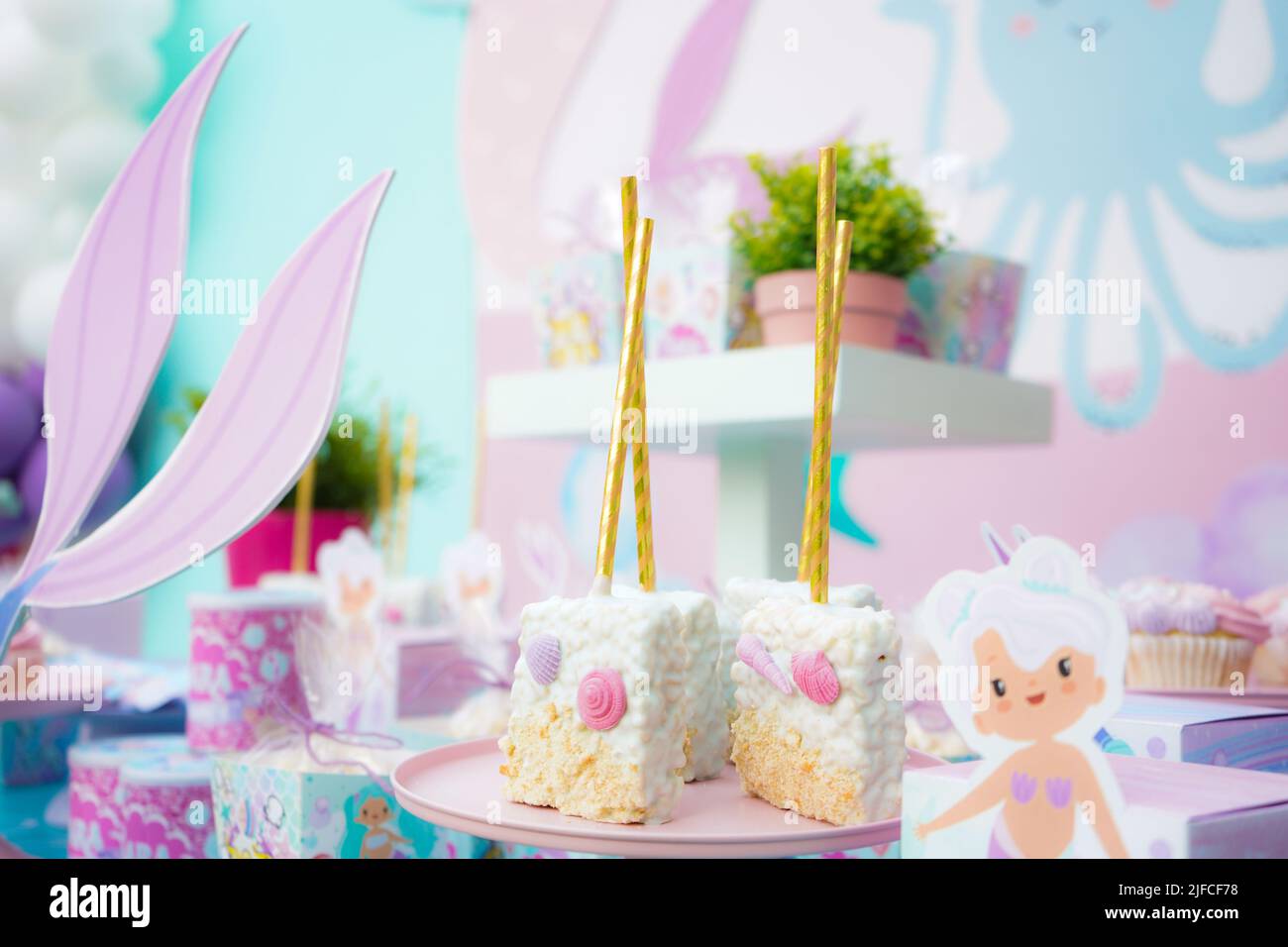Candy table: cupcakes, cookies, and desserts; themed decoration for ...