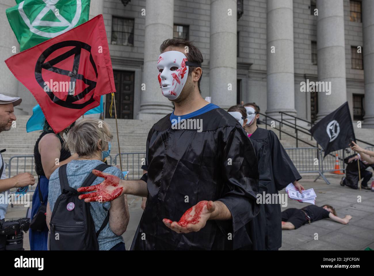 NEW YORK, N.Y. – June 30, 2022: Extinction Rebellion protesters rally ...
