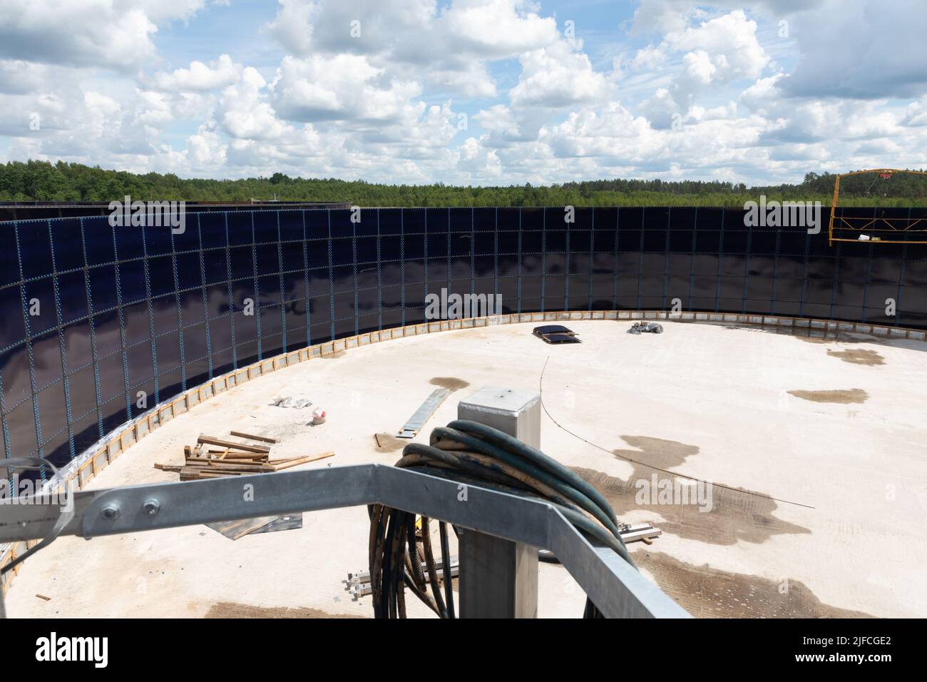 huge manure storage cistern at modern dairy cow farm, top view Stock ...