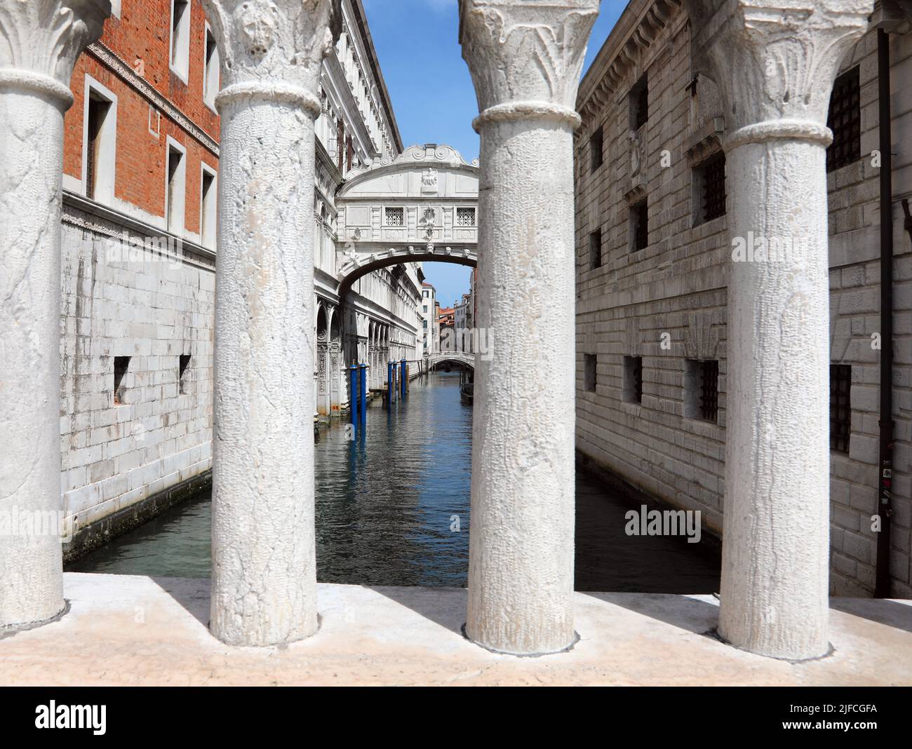 Famous Bridge of Sighs between the banisters in Venice Island in ...