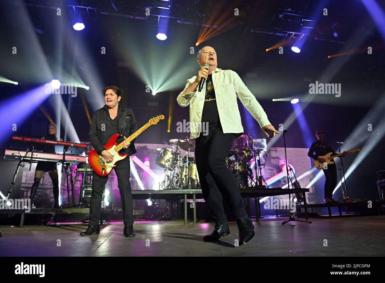 Munich, Germany. 01st July, 2022. From right: Jim KERR., Charlie ...