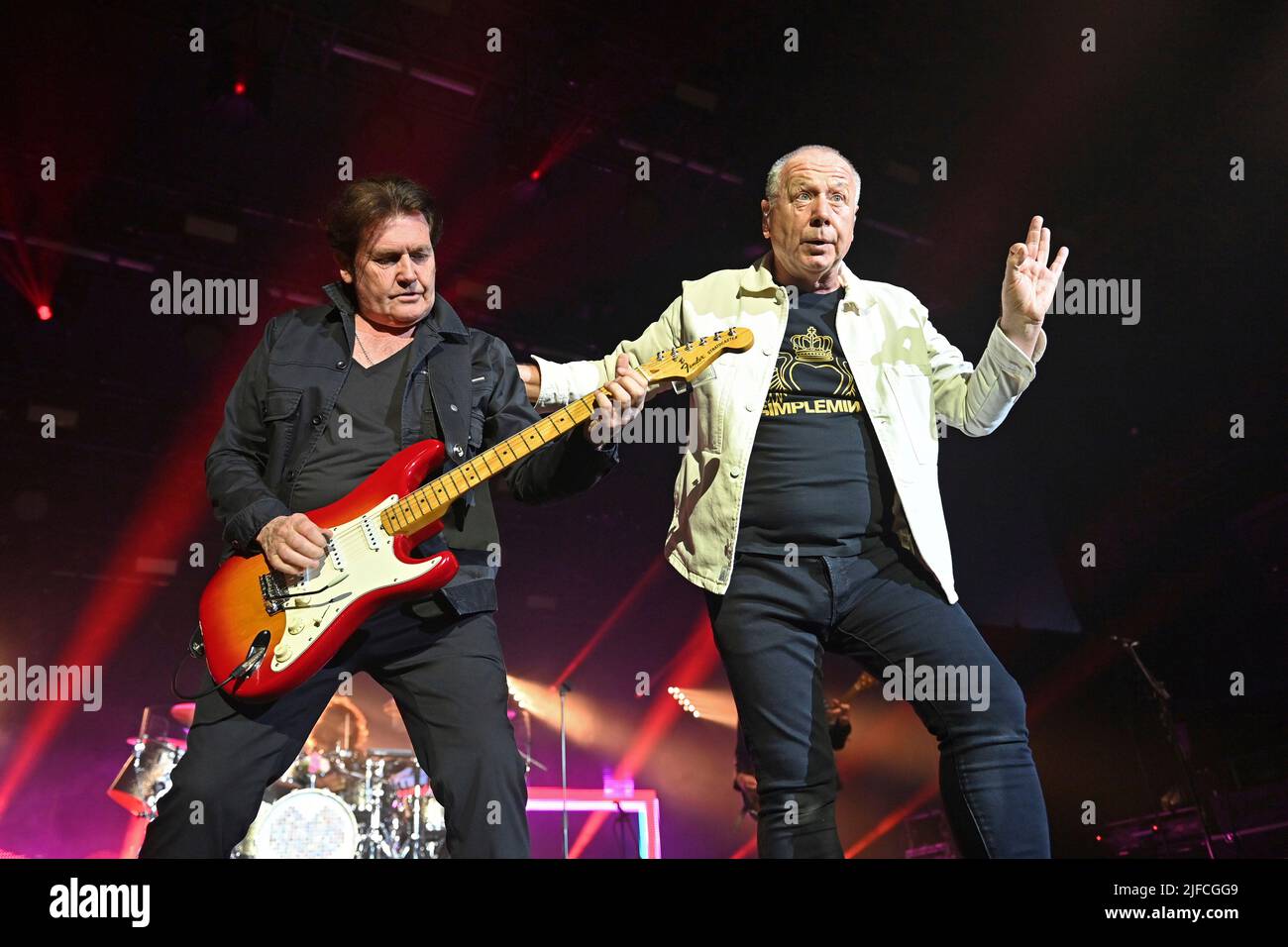 Munich, Germany. 01st July, 2022. From right: Jim KERR., Charlie ...