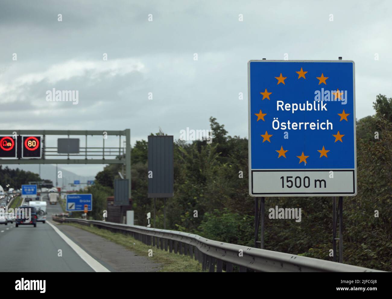 road indication of the Austrian border at 1500 m with the inscription ...