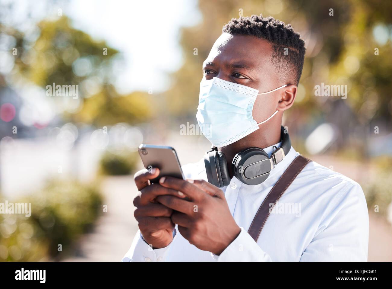 Unrecognizable black man wearing a mask to protect himself from the ...