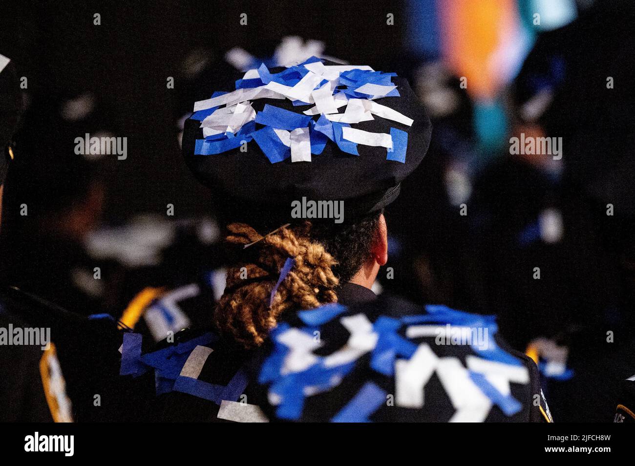 New York City, USA. 01st July, 2022. Confetti on the hat of a graduate ...