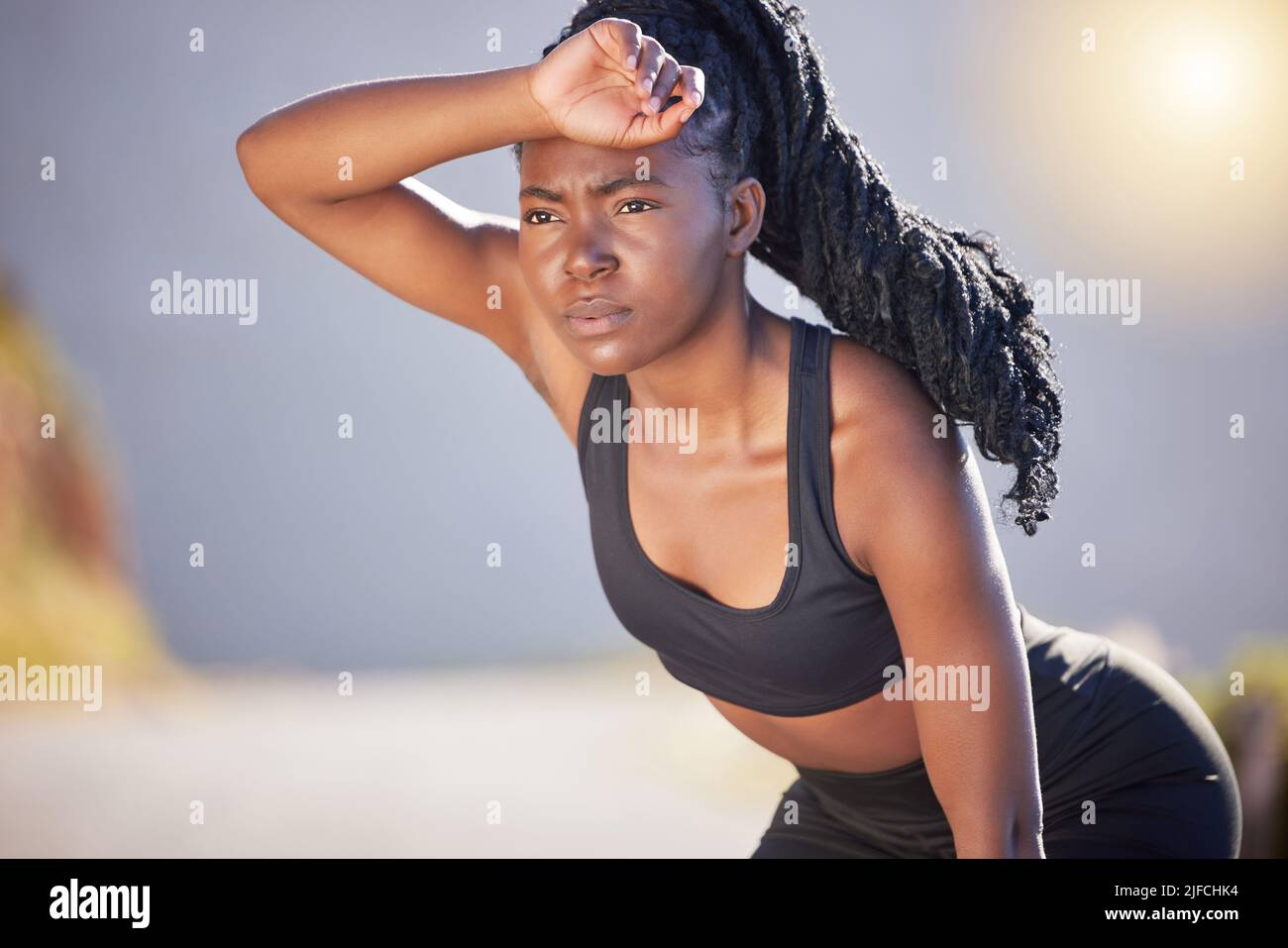 Focused young african female hi-res stock photography and images - Alamy