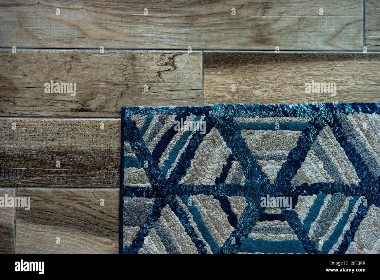 Geometric details on the floor made with ceramic tiles Stock Photo - Alamy