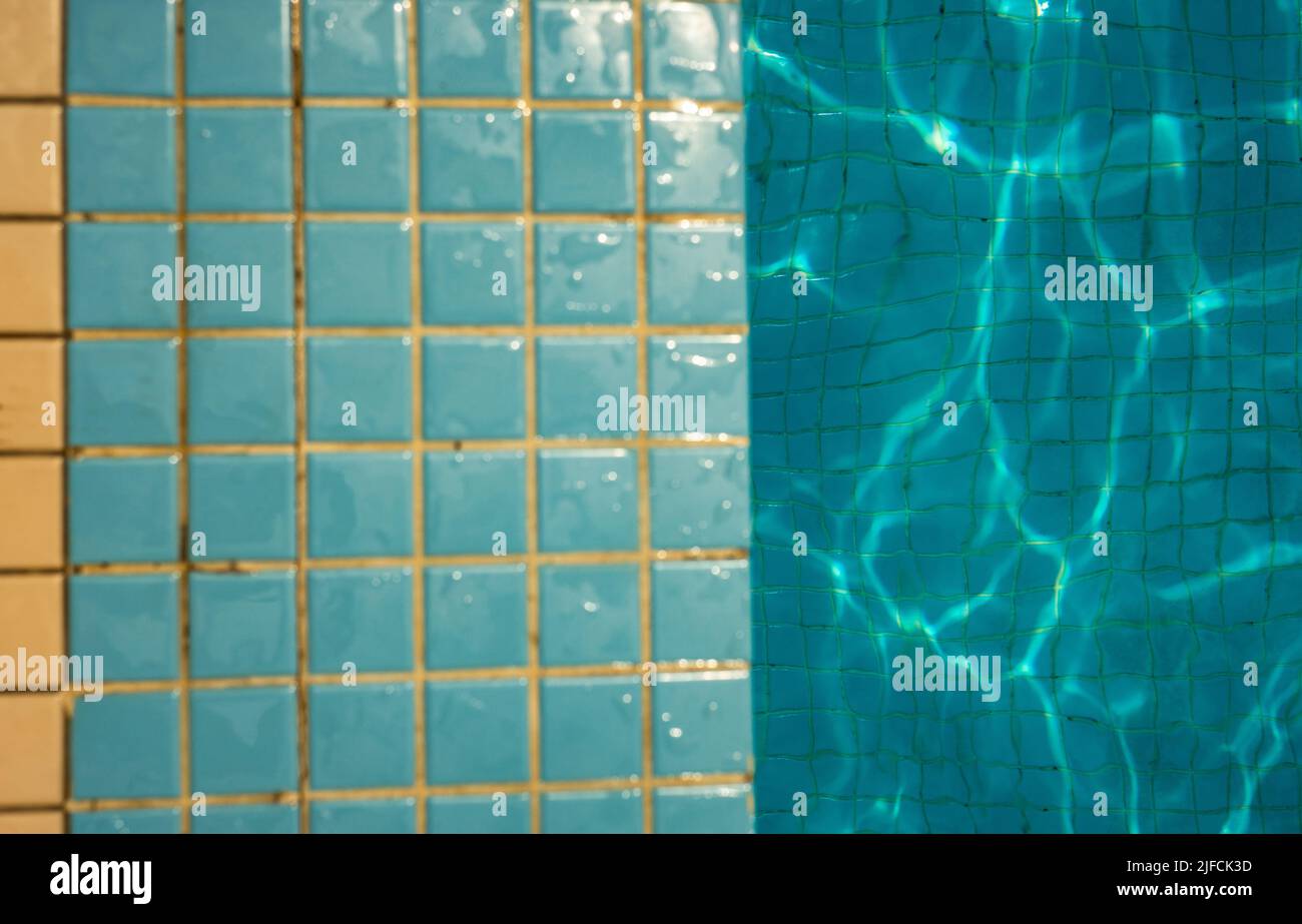 Cool pure blue water in the outdoor pool for relaxing time in summer ...