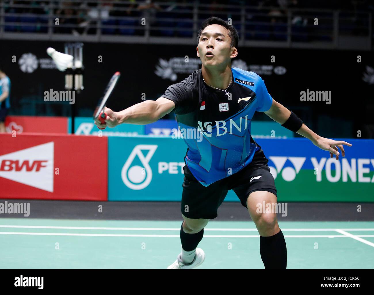 Jonatan Christie of Indonesia competes against Prannnoy of India during ...