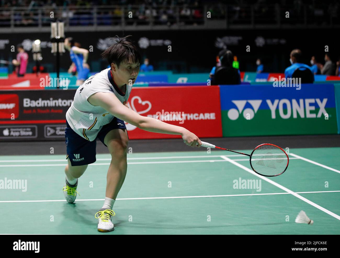 Chen You Fei of China competes against Nozomi Okuhara of Japan during ...