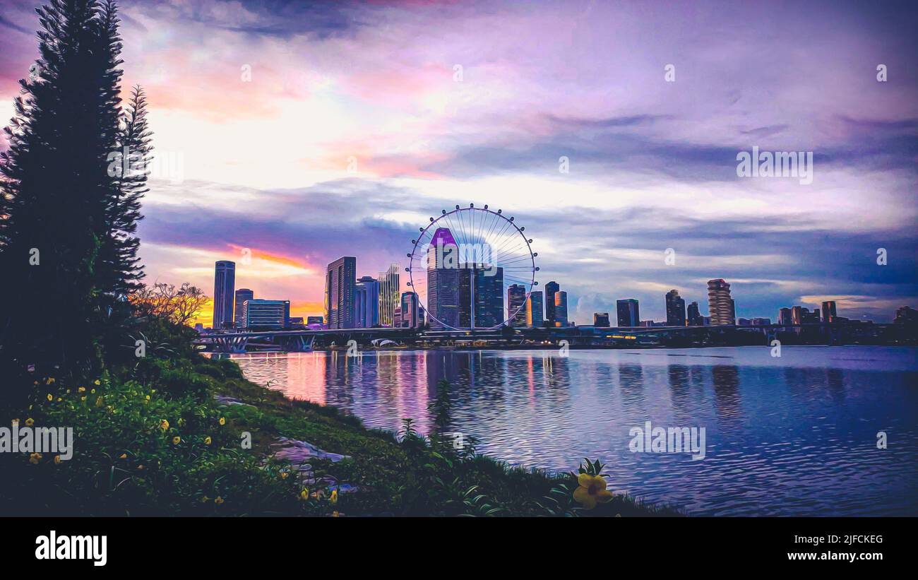 A low angle shot of Singapore skyline from the shore on sunset sky ...